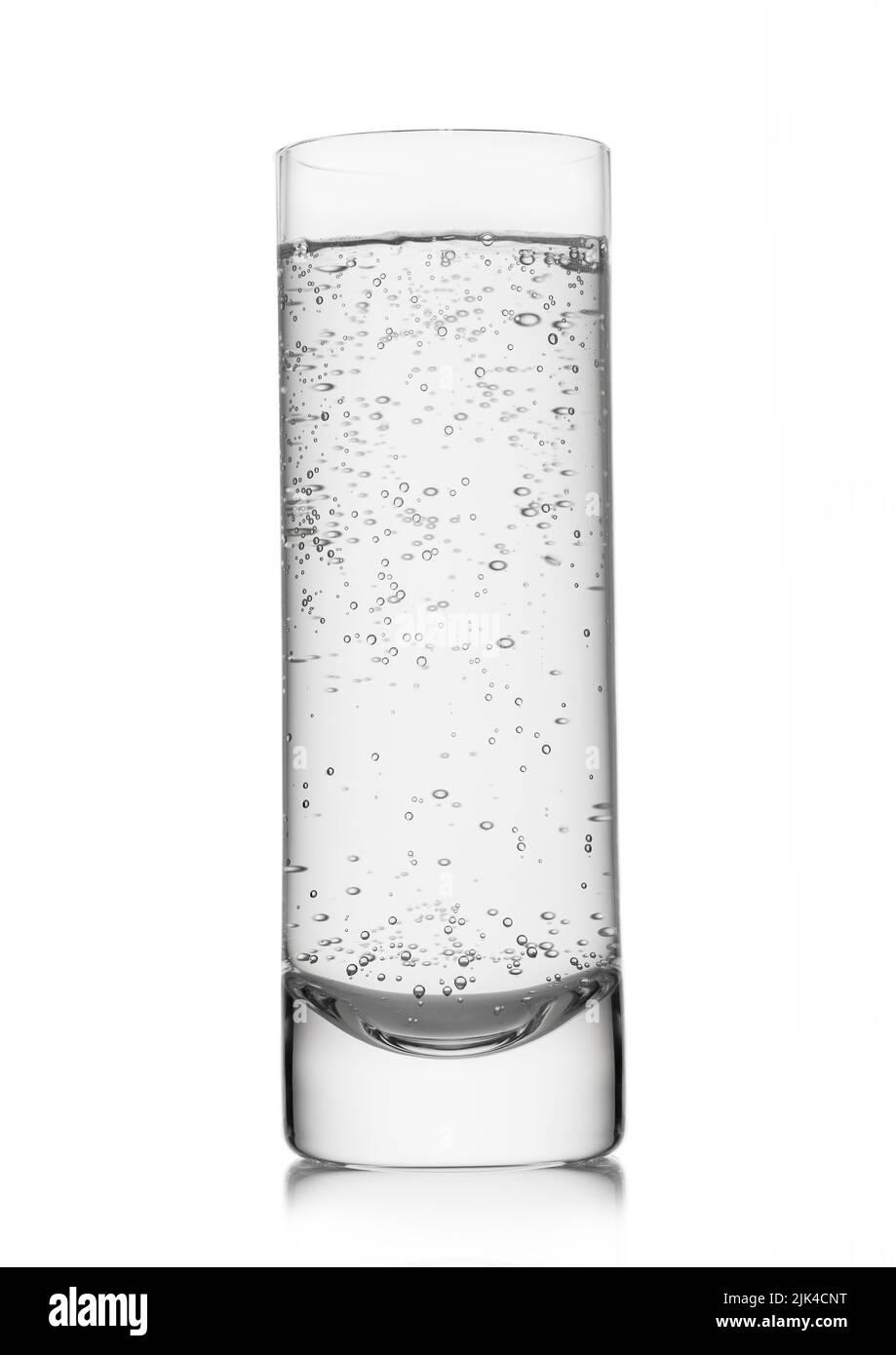 Mineral sparkling water with bubbles in highball glass on white Stock Photo - Alamy