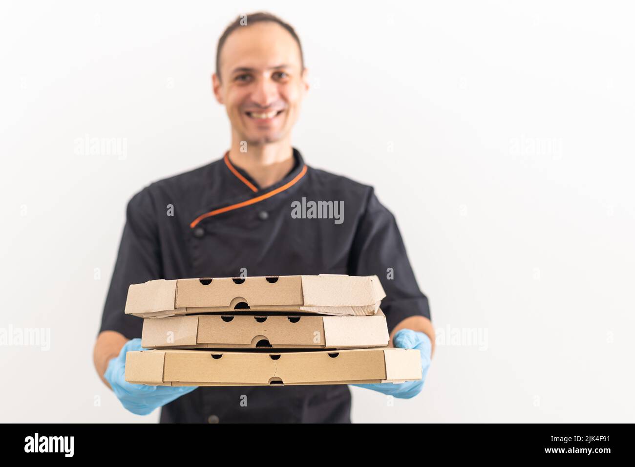 food delivery man wear gloves for cleanliness and hygiene, protect for ...
