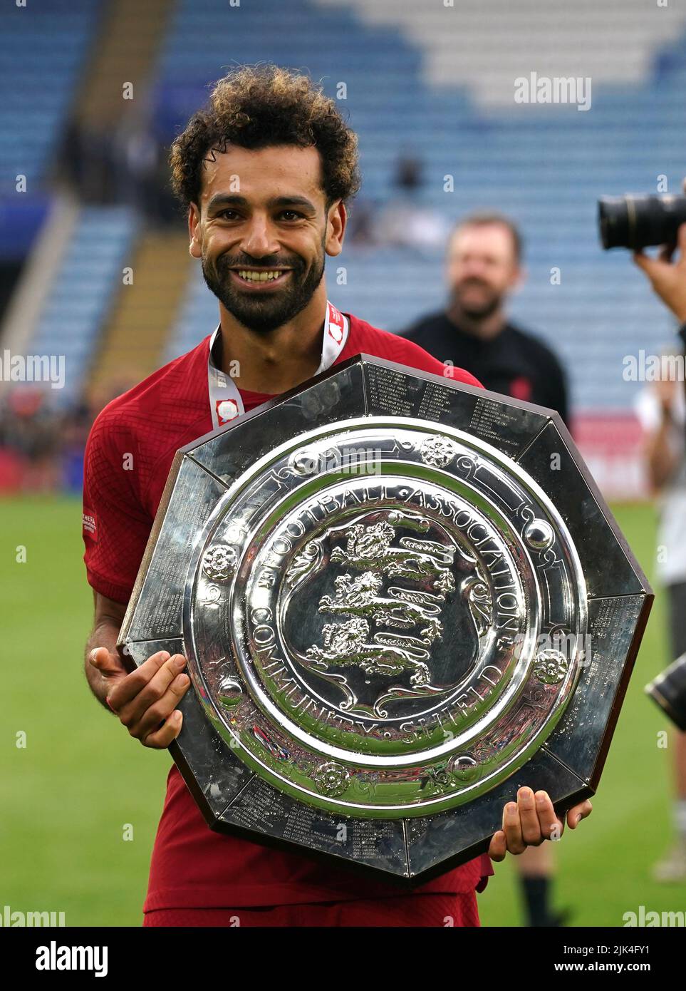 Liverpool's Mohamed Salah celebrates with the community shield trophy ...