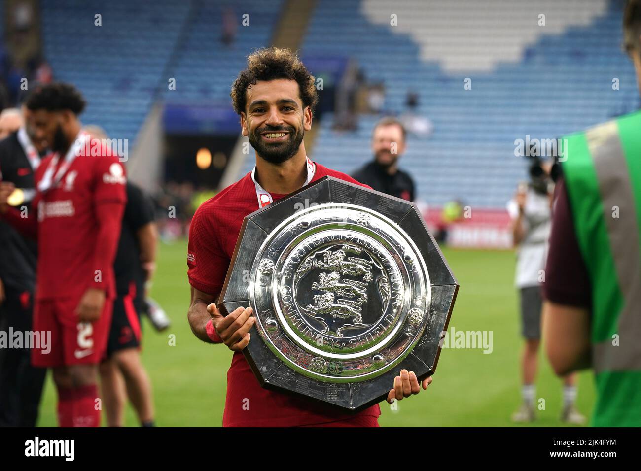 Liverpool's Mohamed Salah celebrates with the community shield trophy ...