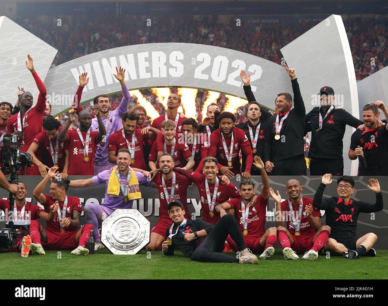 Liverpool players celebrate with the community shield trophy following ...