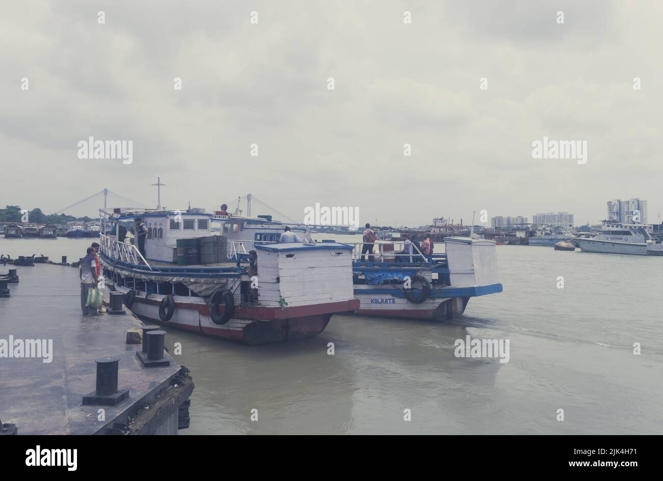 Kolkata Howrah river ferry ghat on a cloudy day. View from BBD Bag ...