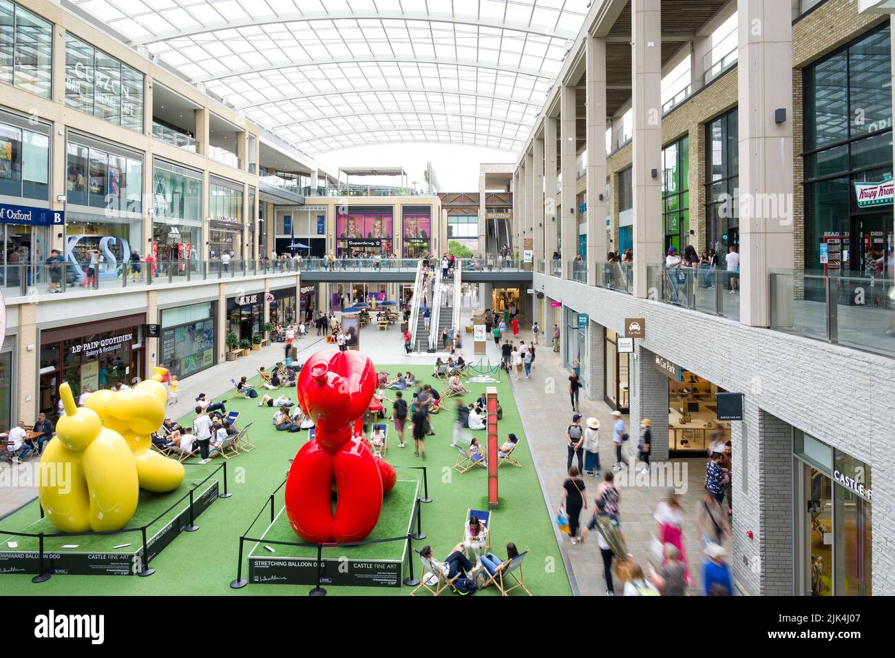Interior of Westgate Shopping Centre with people walking past retail ...