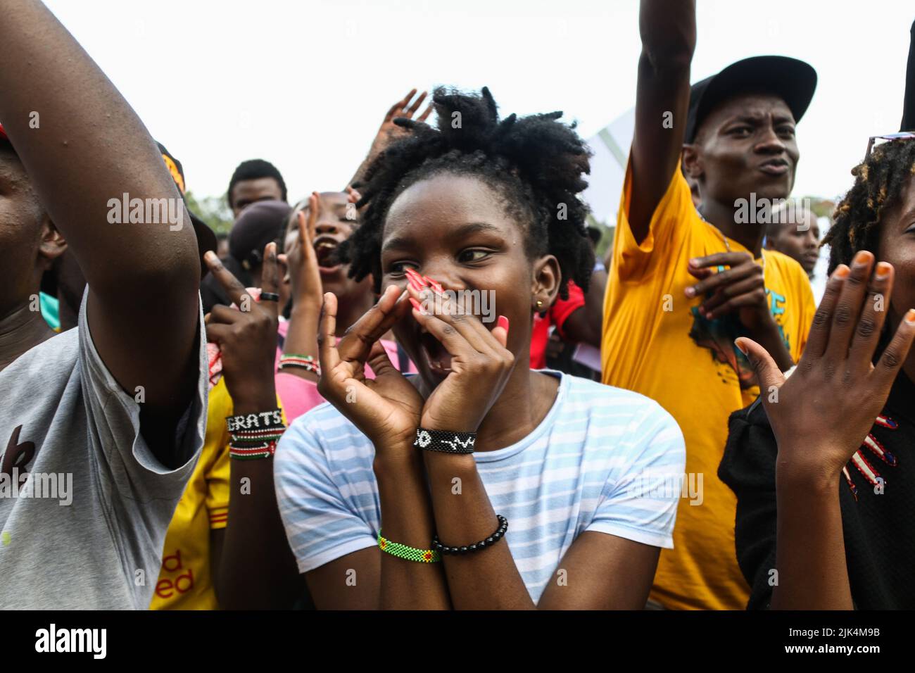 A participant cheers during a peace concert held to preach peace and ...