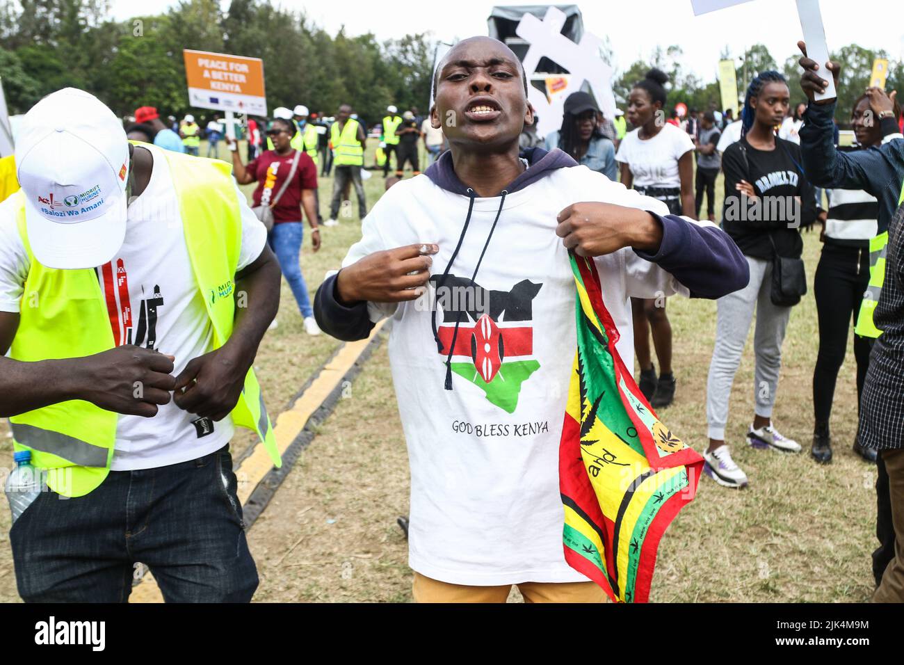 A participant reacts during a peace concert held to preach peace and ...