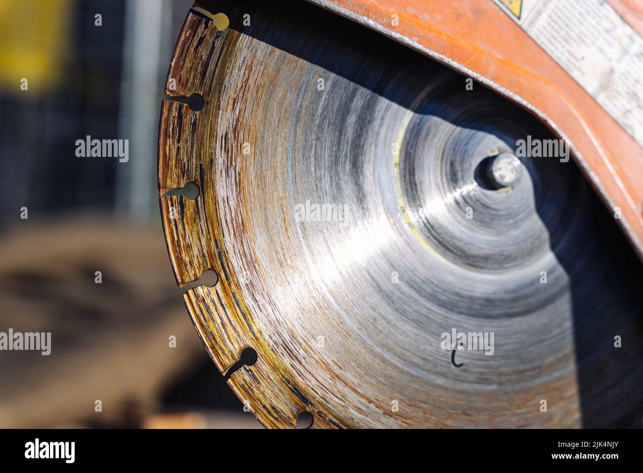 close-up of a saw with a disc for cutting concrete and paving slabs ...