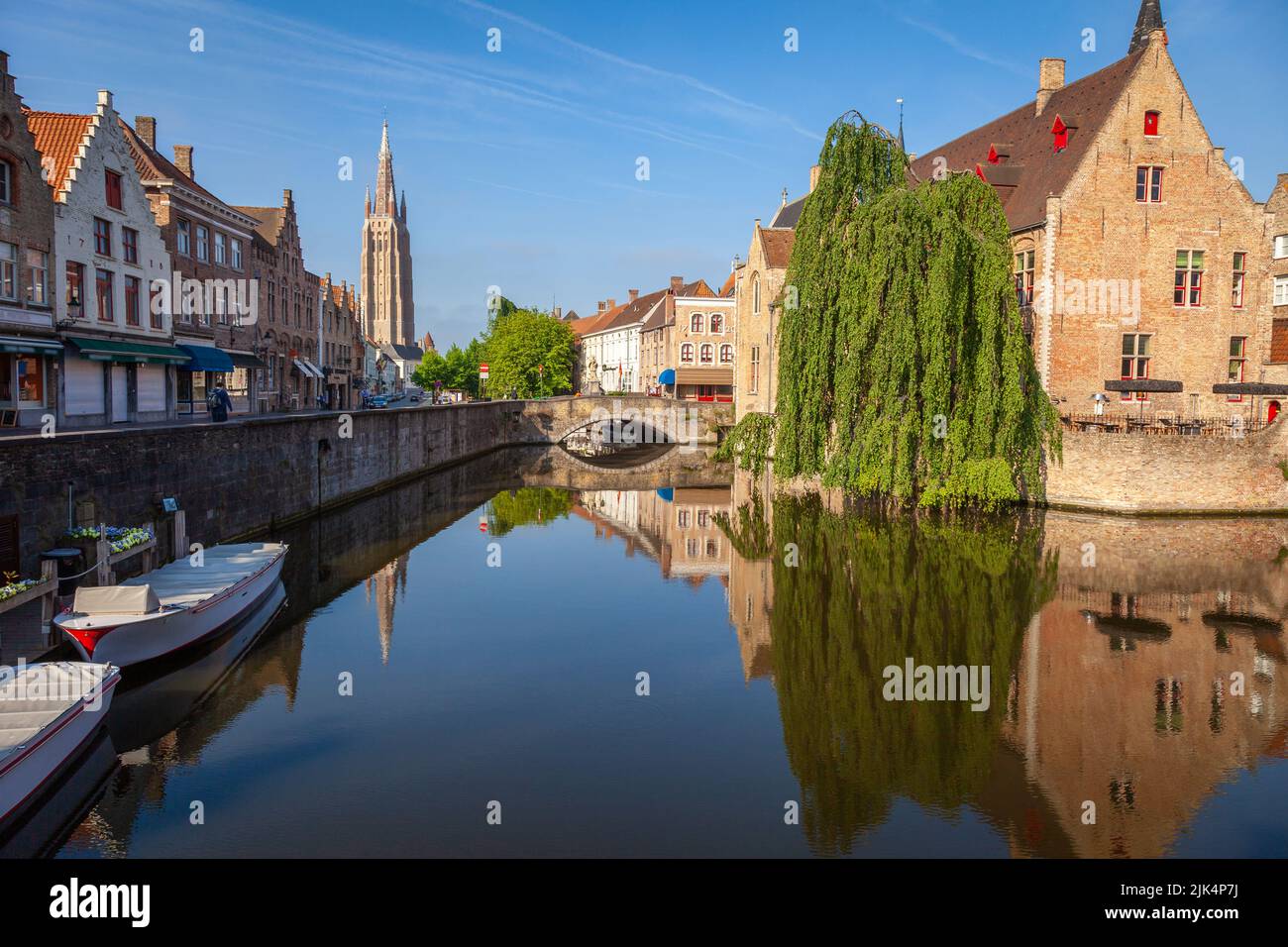 Rozenhoedkaai canal reflection and Church of our Lady, Bruges Stock ...