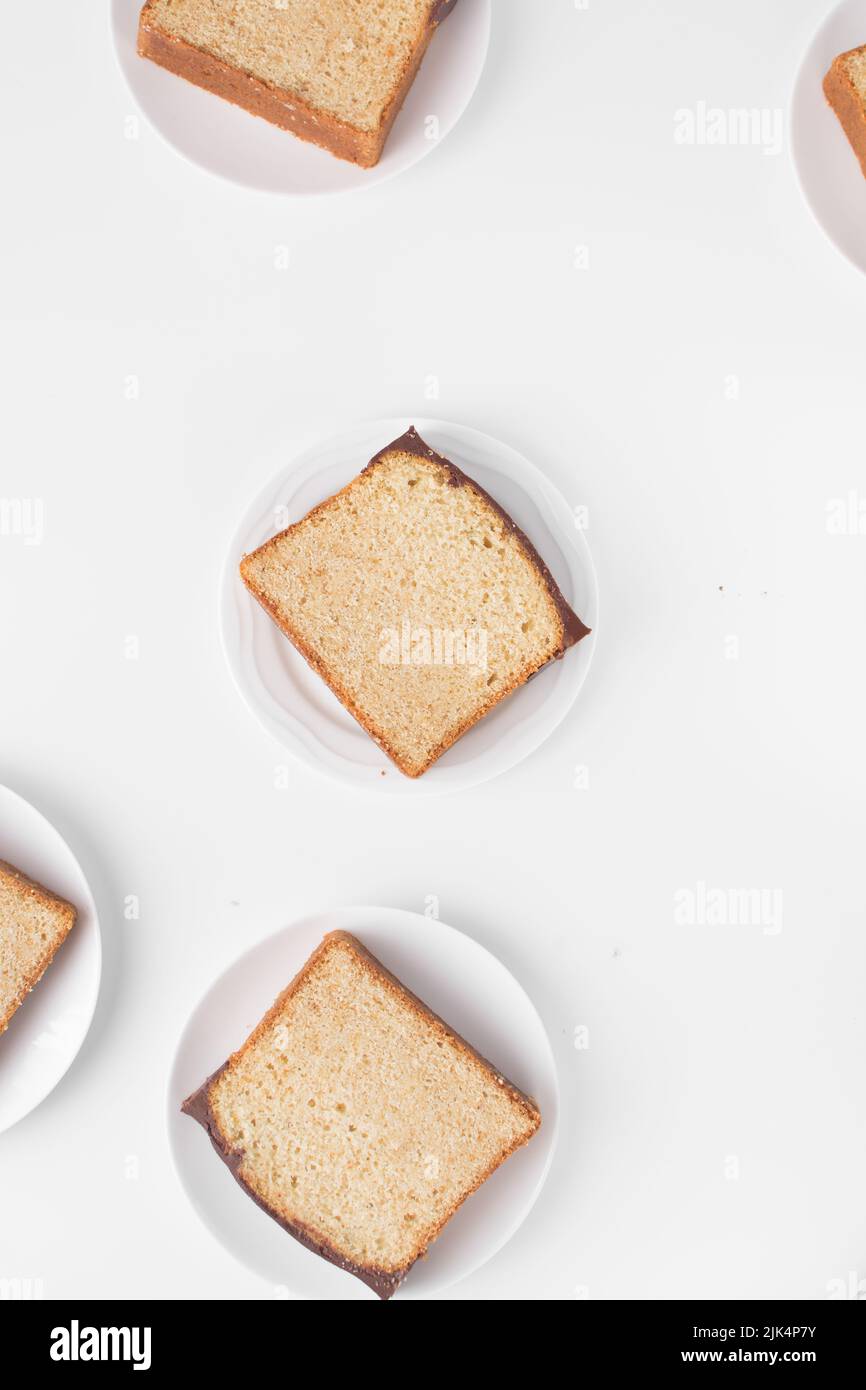 Top view of loaf slices with a chocolate coating, flatlay of vanilla ...
