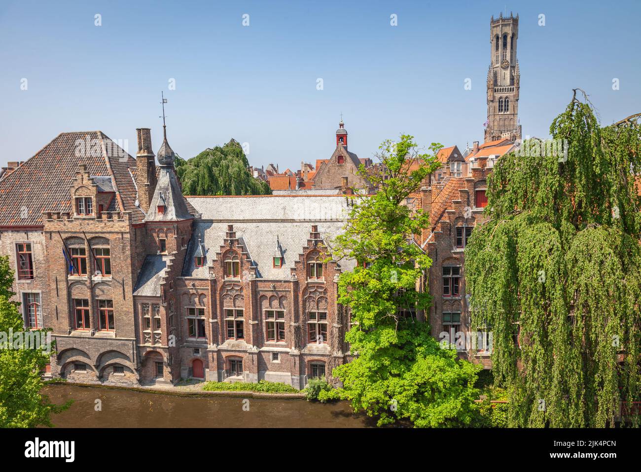 Bruges belfry tower, above flemish architecture and canal, Belgium ...