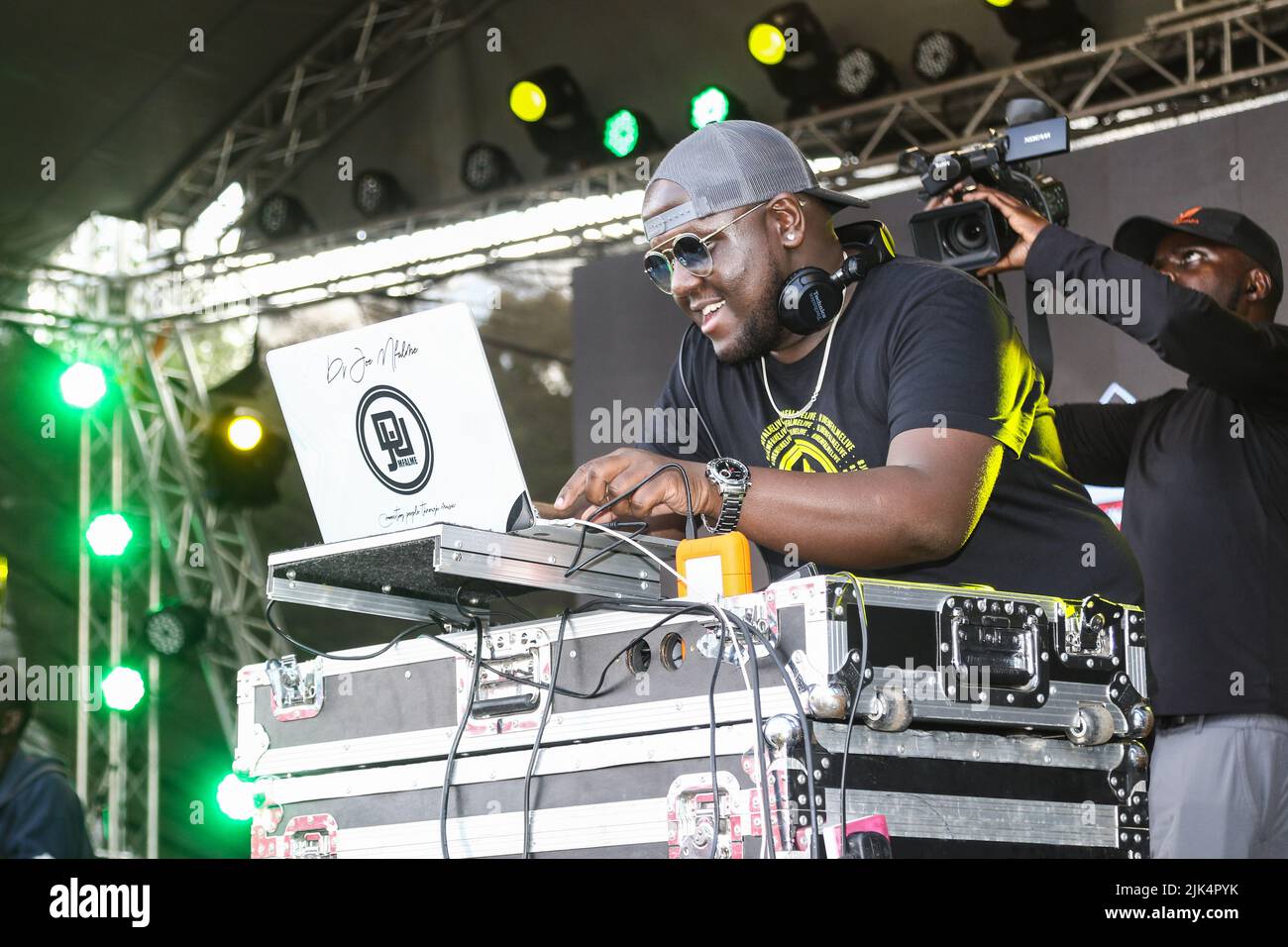 DJ Joe Mfalme performs during a peace concert held to call for peace ...