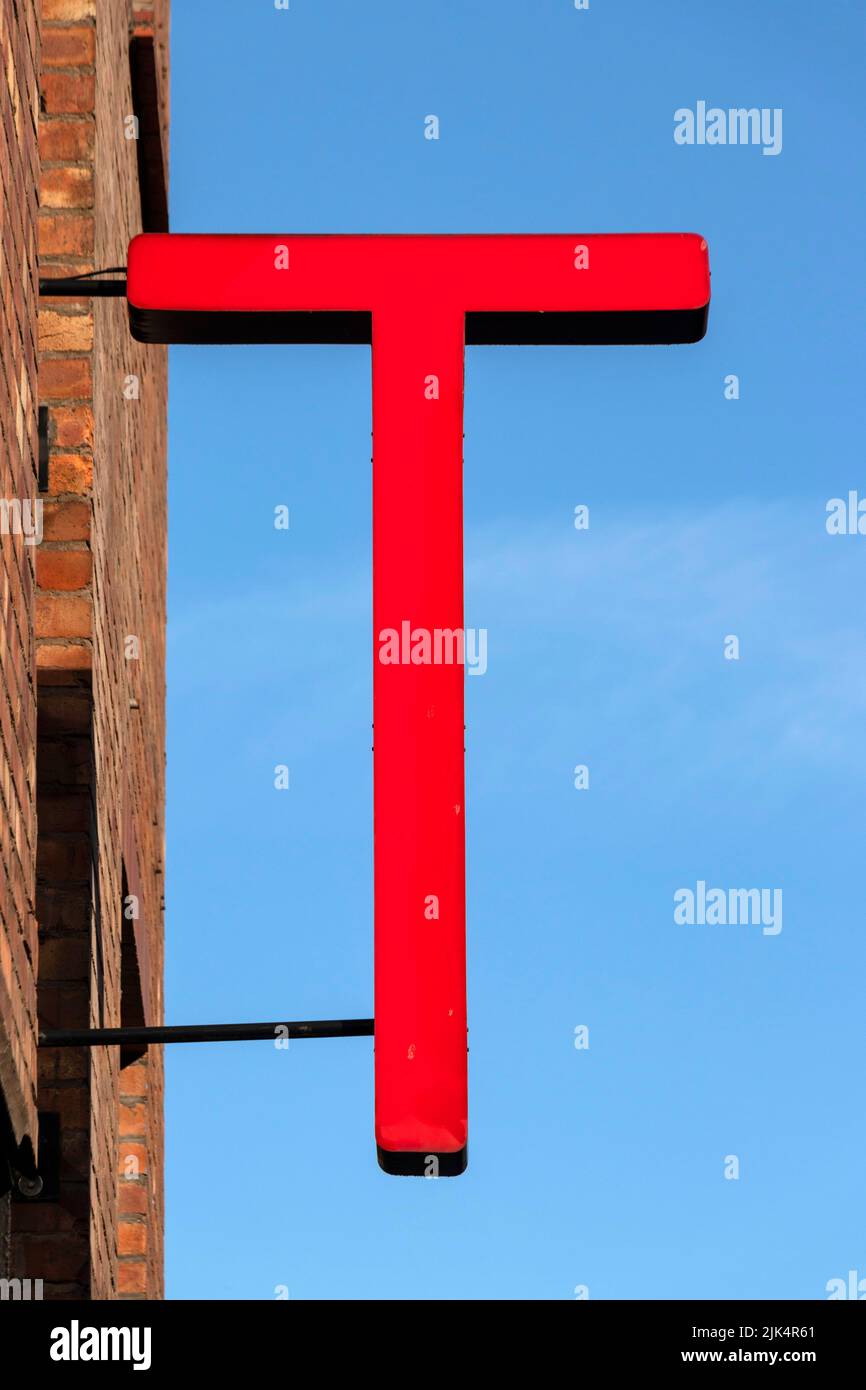 red single capital letter T sign on building in Liverpool Stock Photo ...
