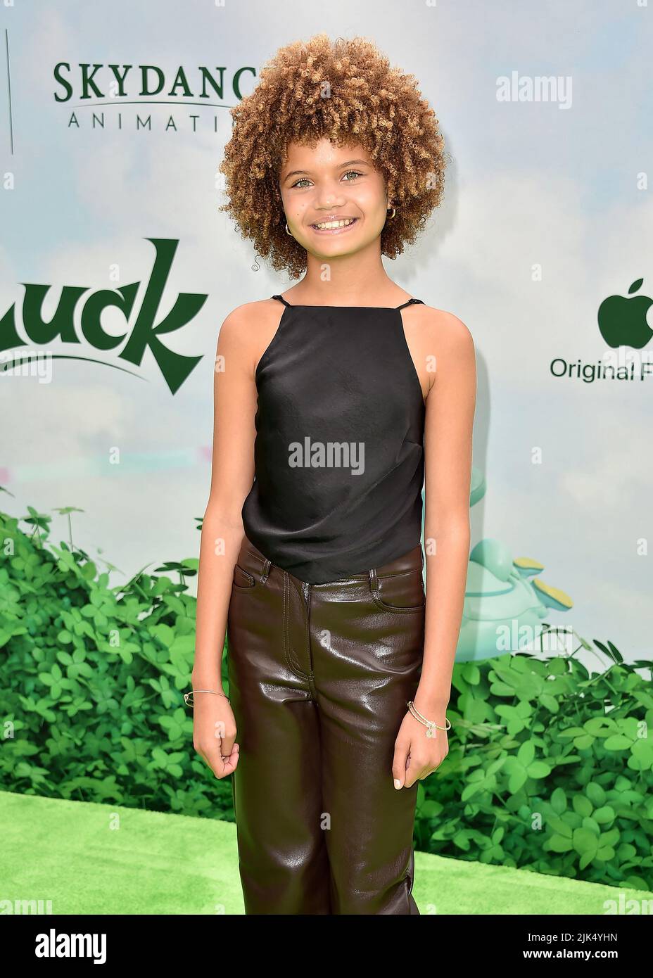 Carsyn Rose walking on the red carpet at the global premiere of the ...