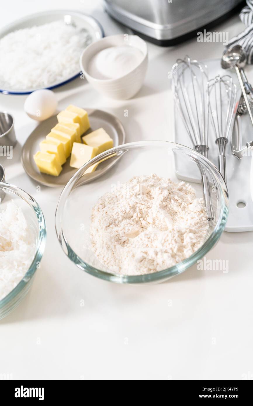 Ingredient to bake coconut cookies on the kitchen counter Stock Photo ...