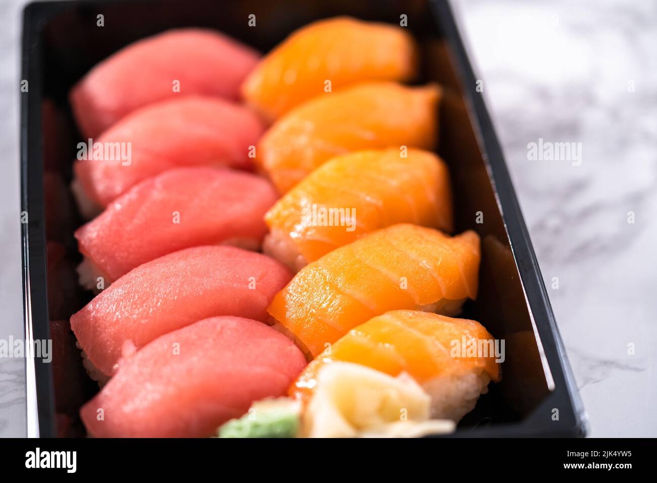 Pre-packaged sushi in a plastic tray Stock Photo - Alamy