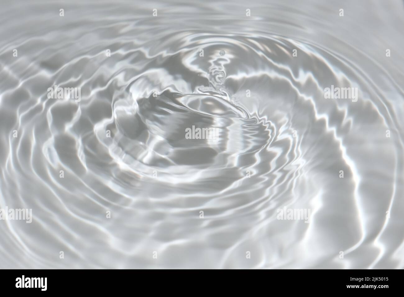 Light gray transparent clear calm water surface texture with splashes ...