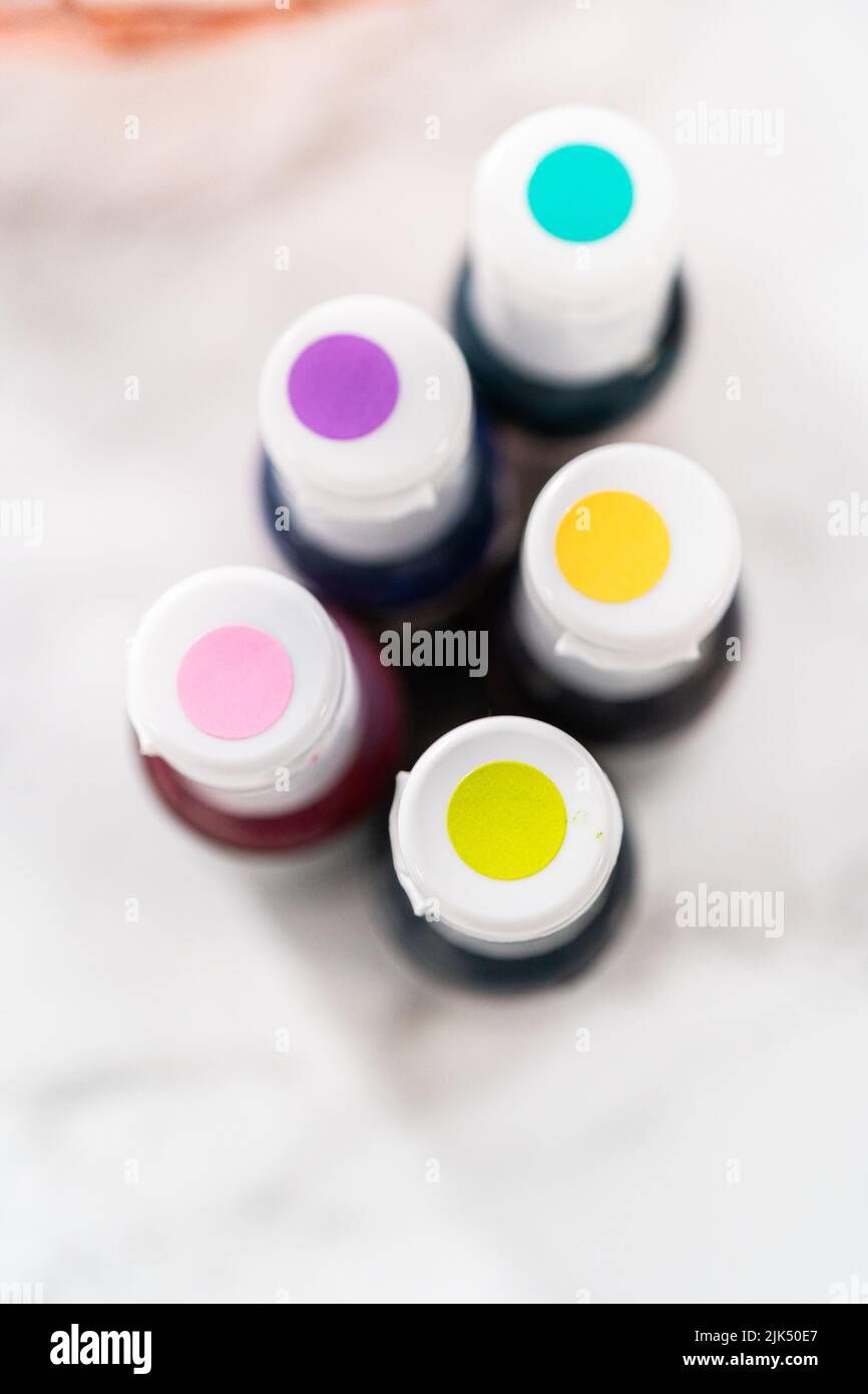 Easter egg coloring. Measured ingredients in glass mixing bowls to dye ...