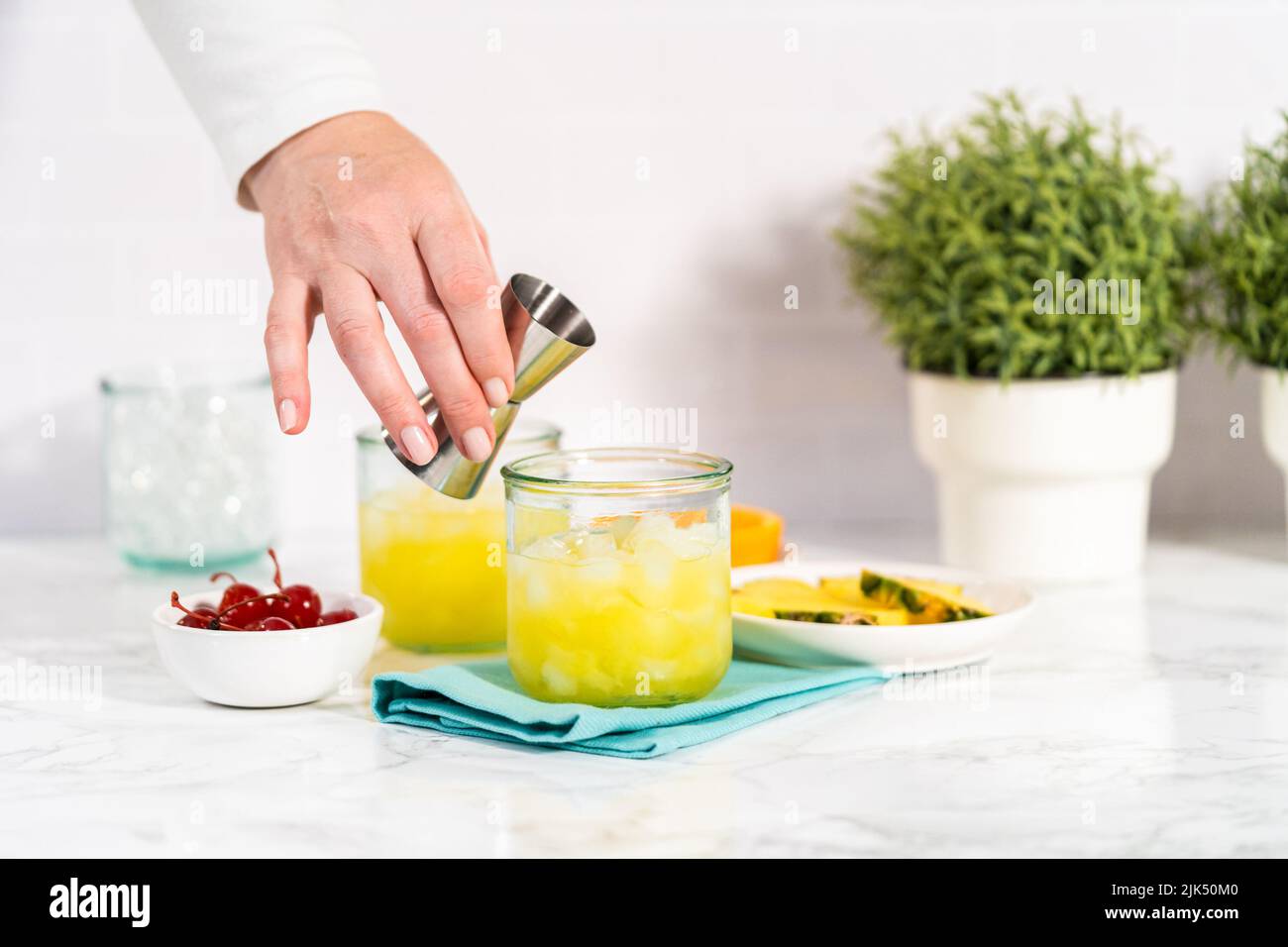 Step by step. Mixing Sunset cocktail with fresh ingredients Stock Photo ...