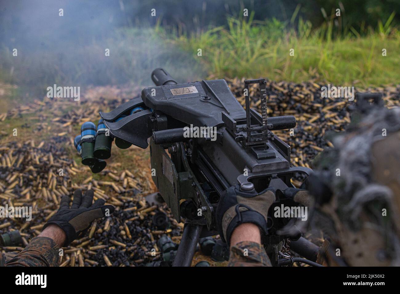 U.S. Marines with 3d Battalion, 2d Marines fire an MK19 grenade ...