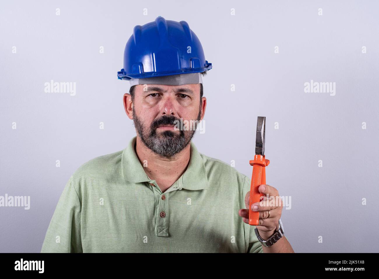Portrait of 60 years old professional heavy industry engineer/worker ...
