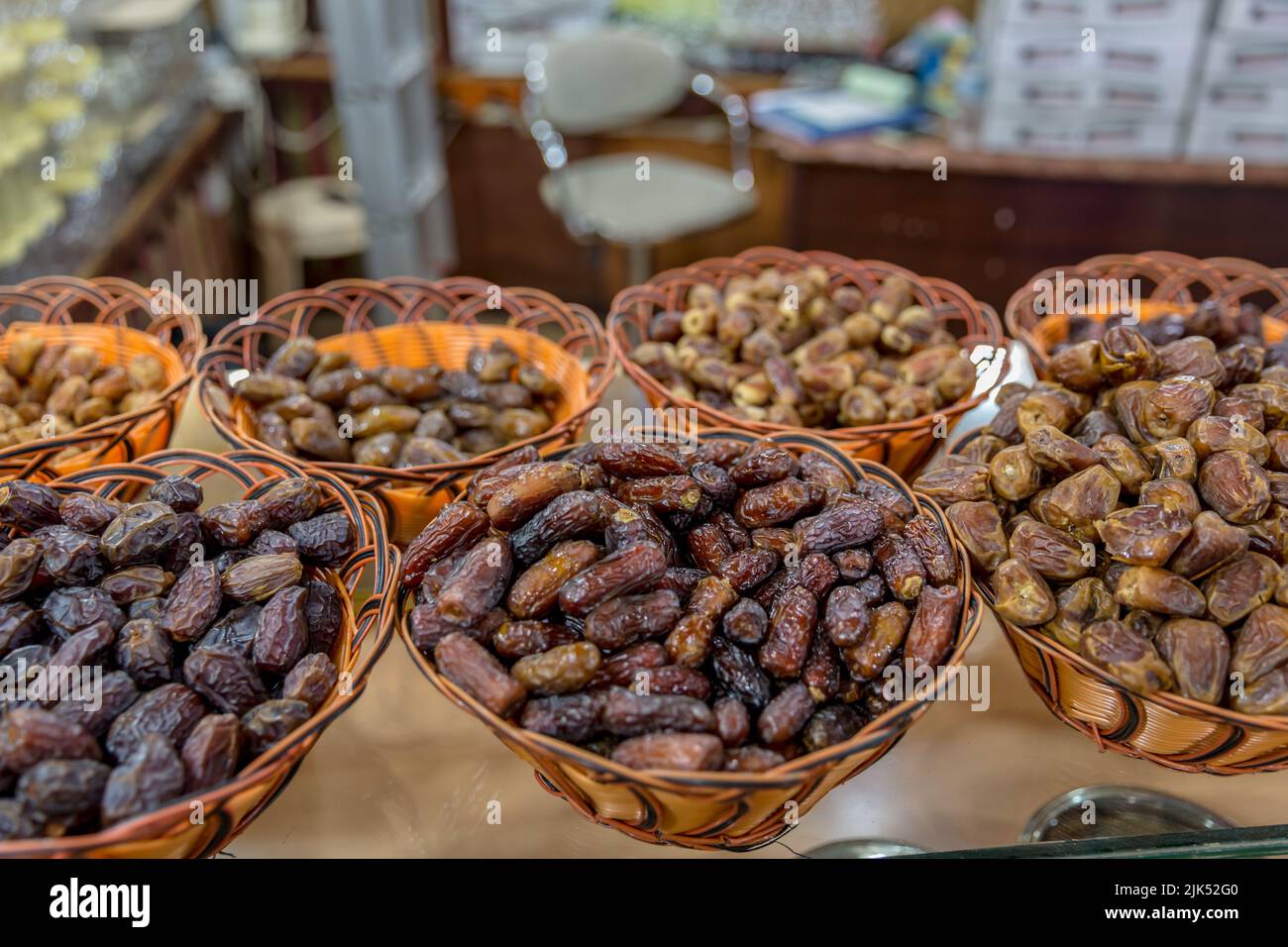 Basket of dates for selling in Doha, Qatar Stock Photo - Alamy