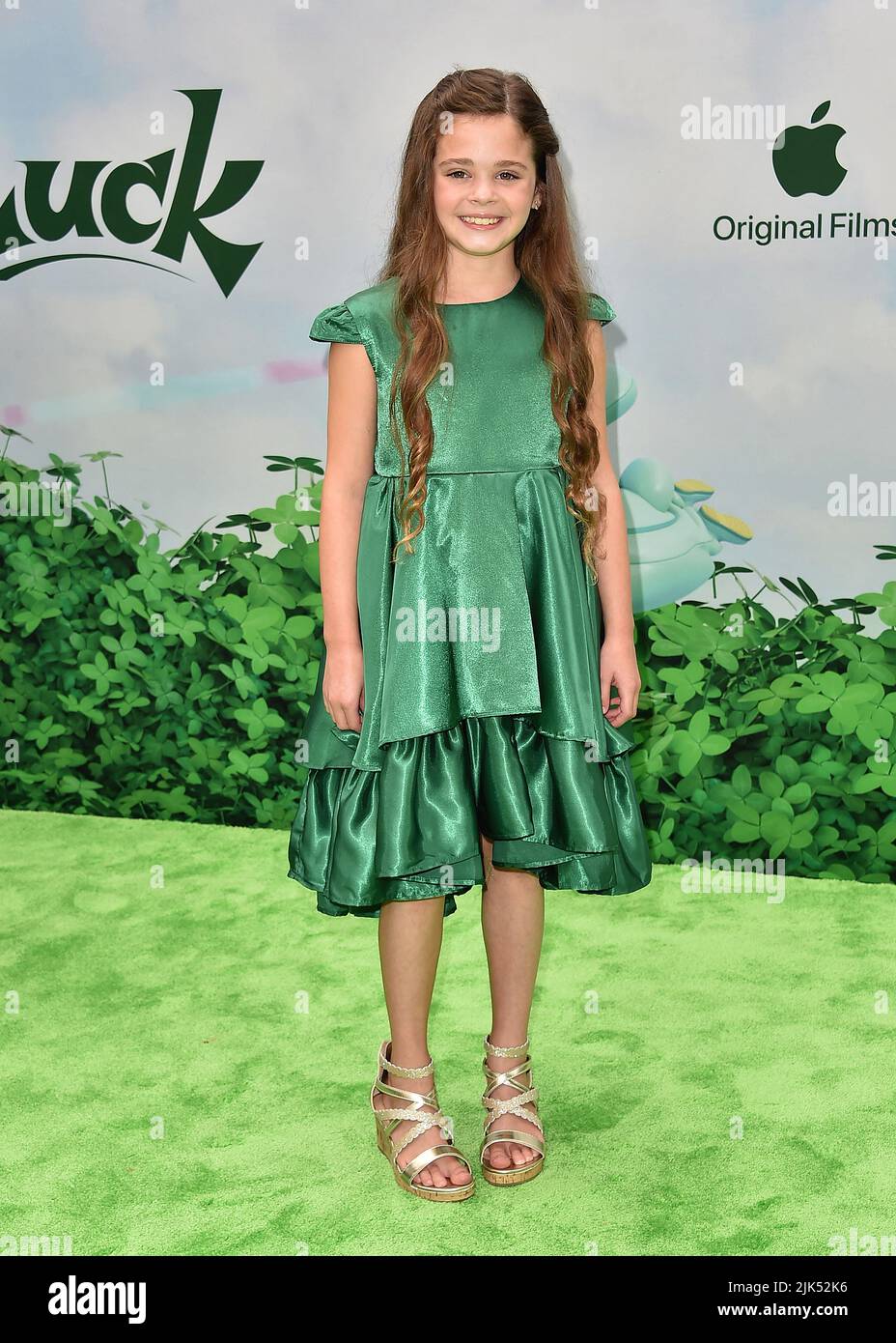 Adelynn Spoon walking on the red carpet at the global premiere of the ...