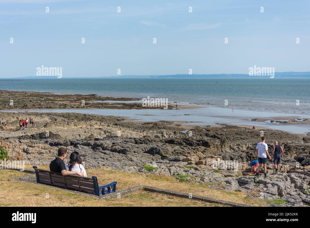 Rocks rocky couple seated beach promenade esplanade porthcawl br hi-res ...