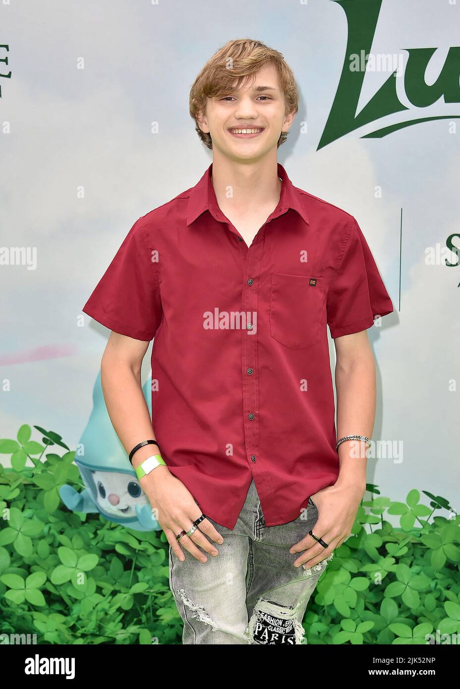 Mason McNulty walking on the red carpet at the global premiere of the ...