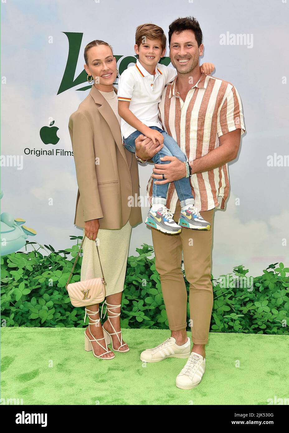 Peta Murgatroyd,Maksim Chmerkovskiy and son Shai walking on the red ...