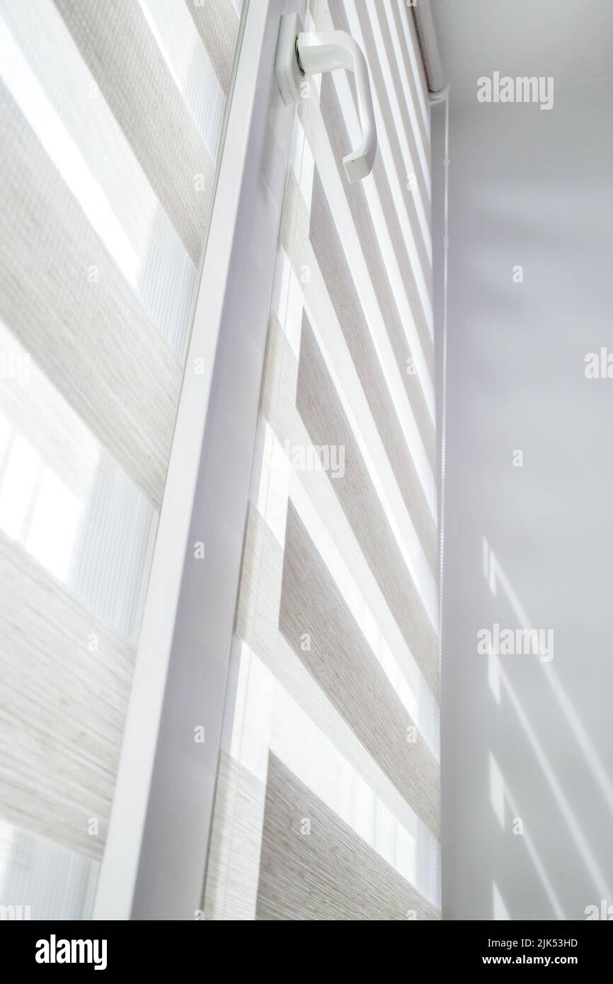 Window roller duo system day and night. Close up on roll curtains ...