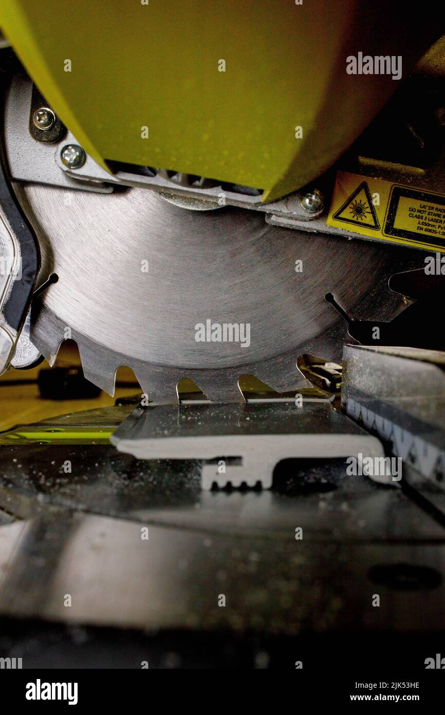 The circular saw cuts the plinth. Tool for repair work Stock Photo - Alamy