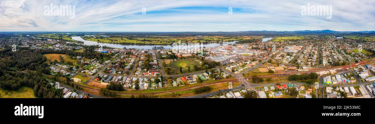 Wide aerial townscape panorama of Taree town on Manning river in ...