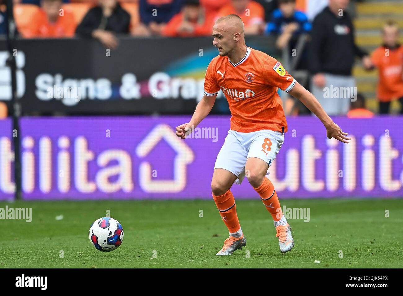 Lewis Fiorini #8 of Blackpool makes a break with the ball Stock Photo ...