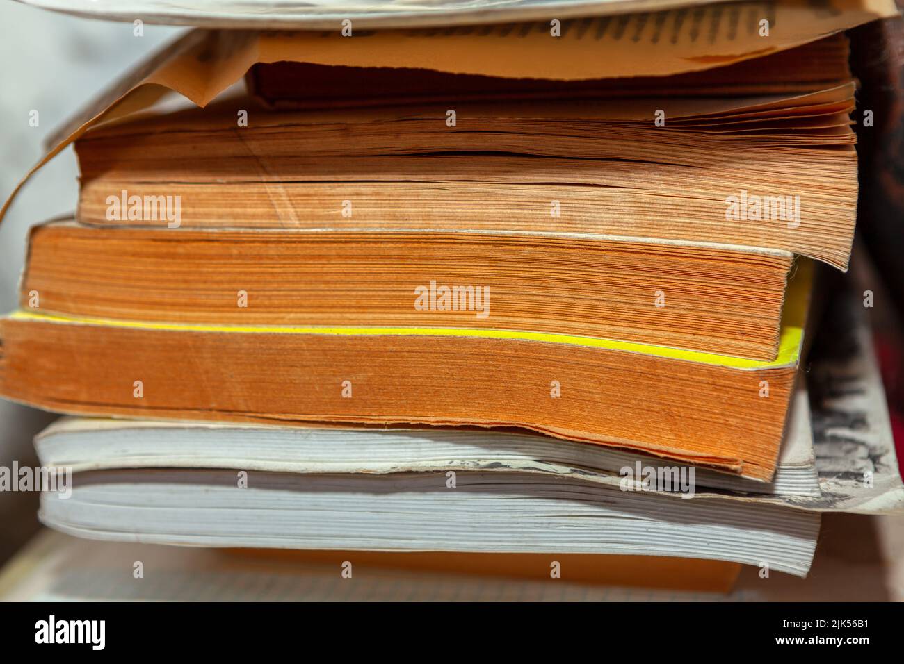 Set of books side view . Old paper background Stock Photo - Alamy