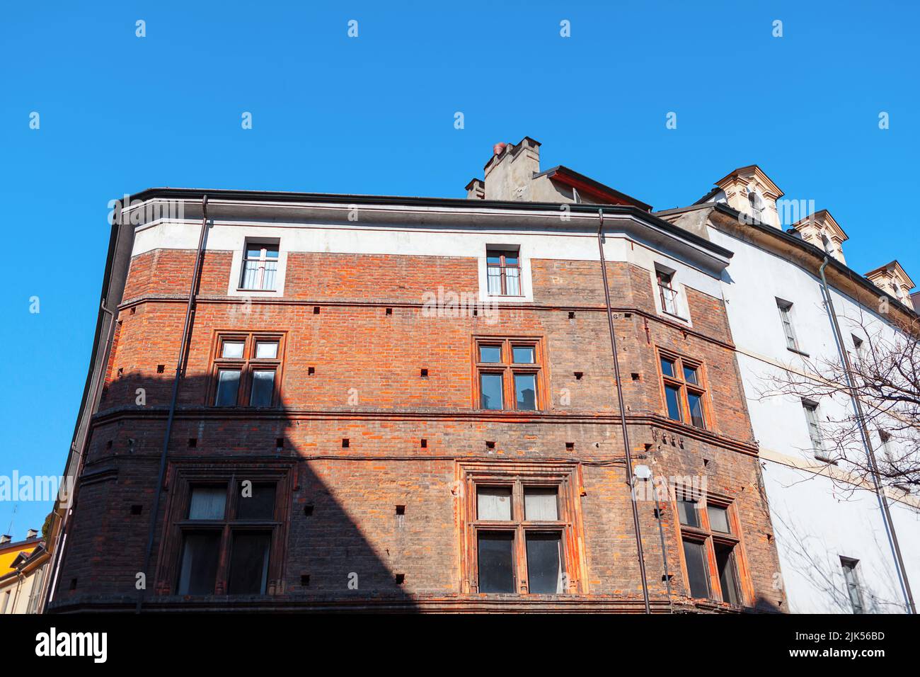 Building with brick wall and attics in Turin Italy . Traditional ...