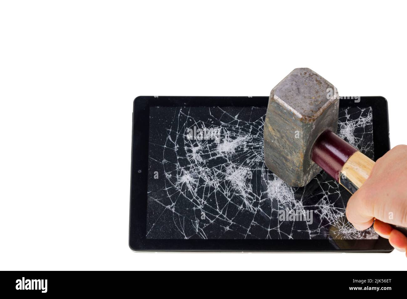 Close up view of man's hand crashing tablet with sledgehammer isolated ...