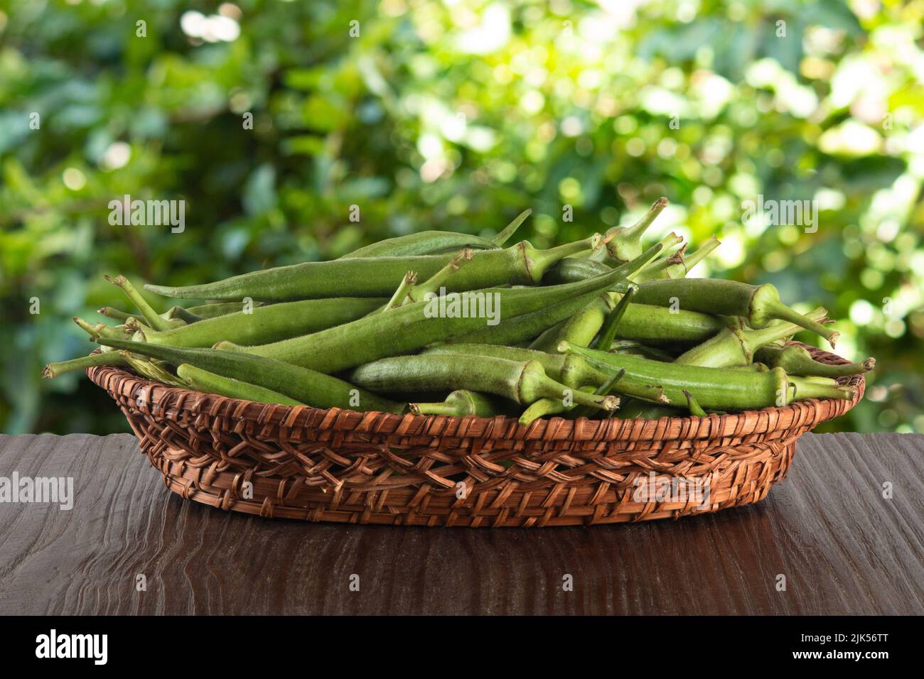Fresh green okra in basket. Caruru ingredient Stock Photo - Alamy