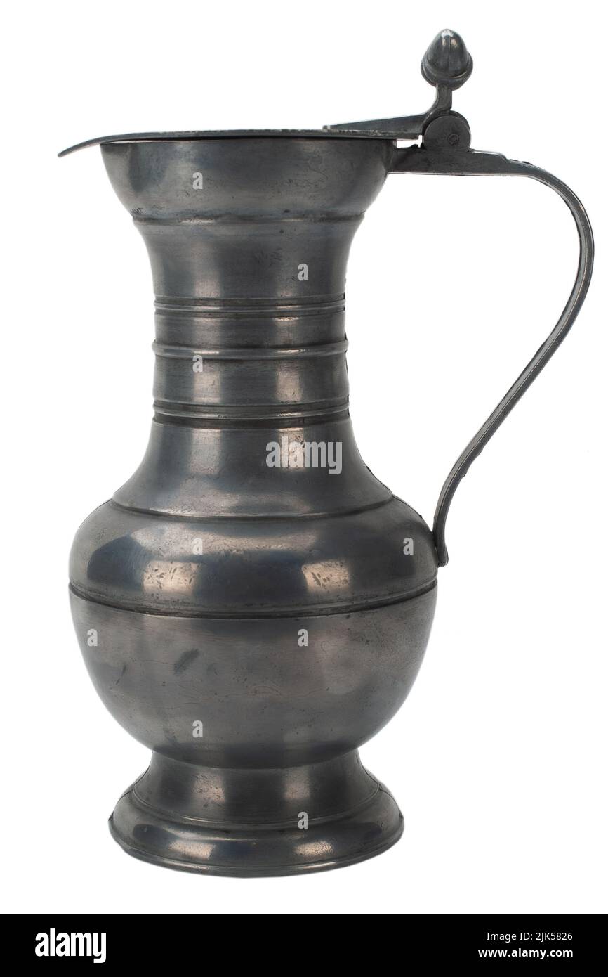 Vintage antique pewter water jug isolated on a white background Stock ...