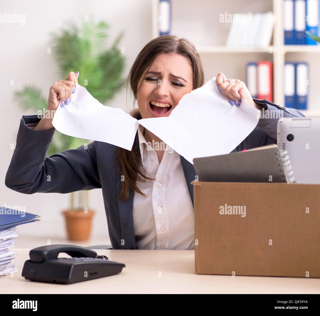 The dismissal and firing concept with woman employee Stock Photo - Alamy