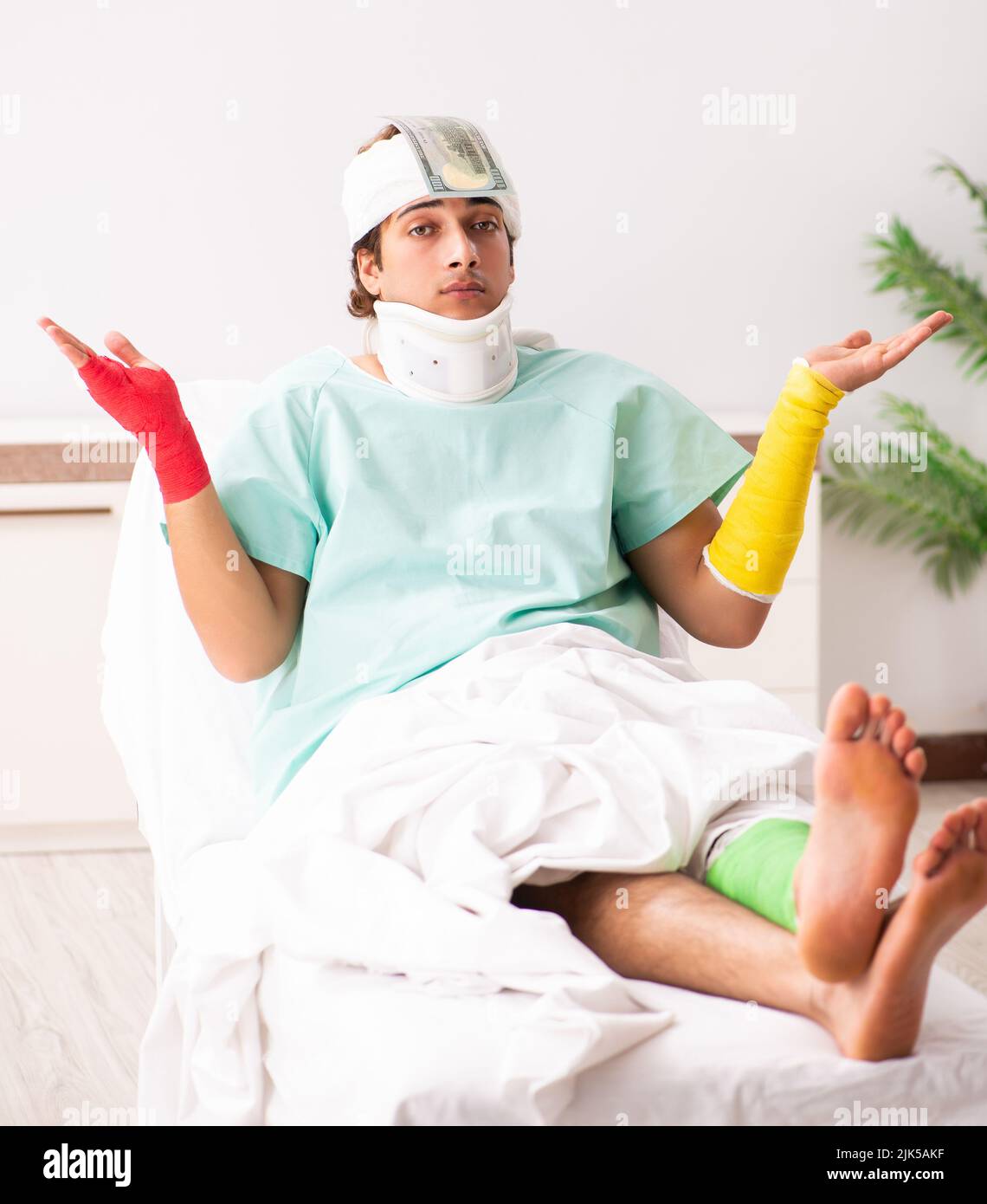 The young injured man staying in the hospital Stock Photo - Alamy