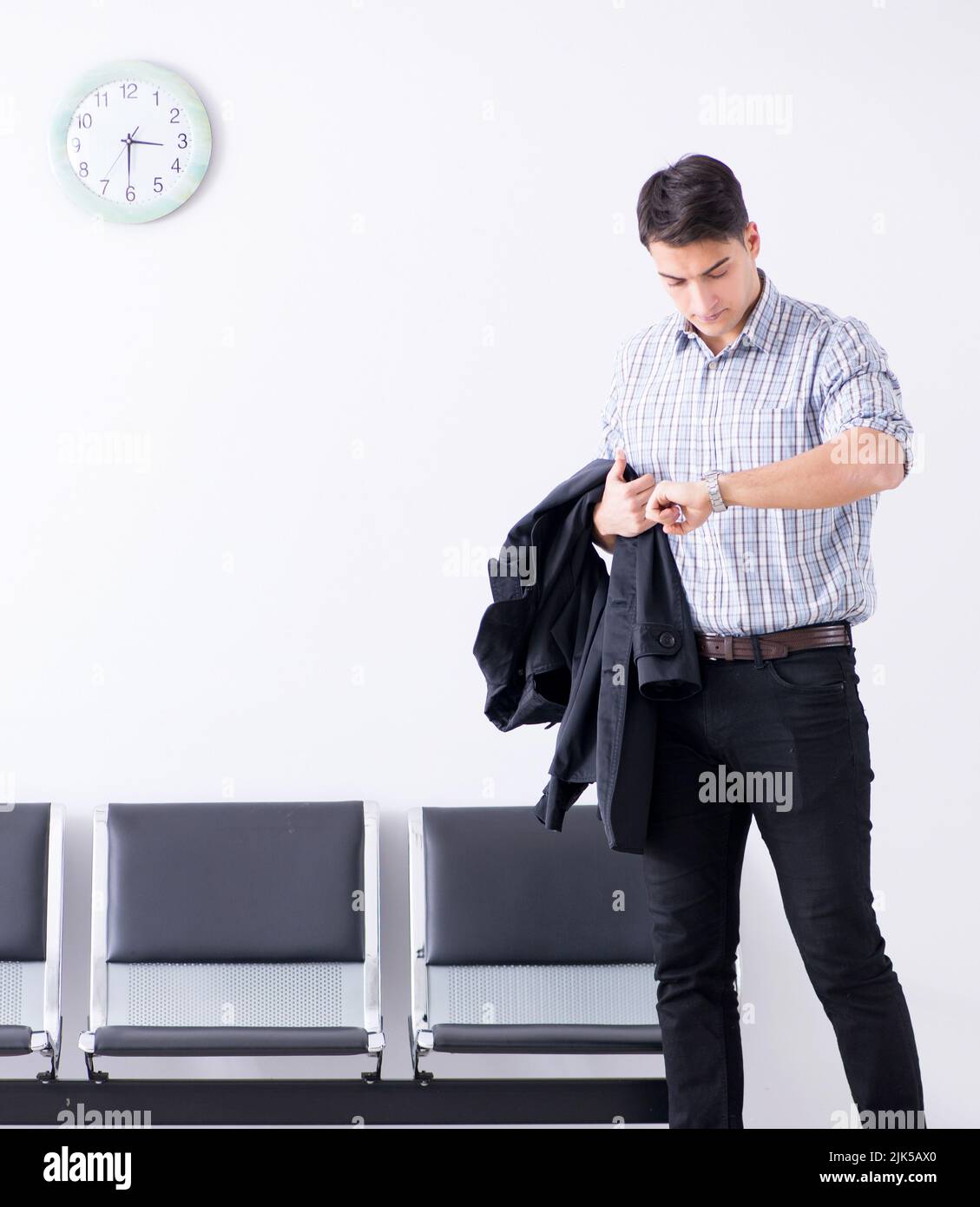 The man nervously impatiently waiting in the lobby Stock Photo - Alamy