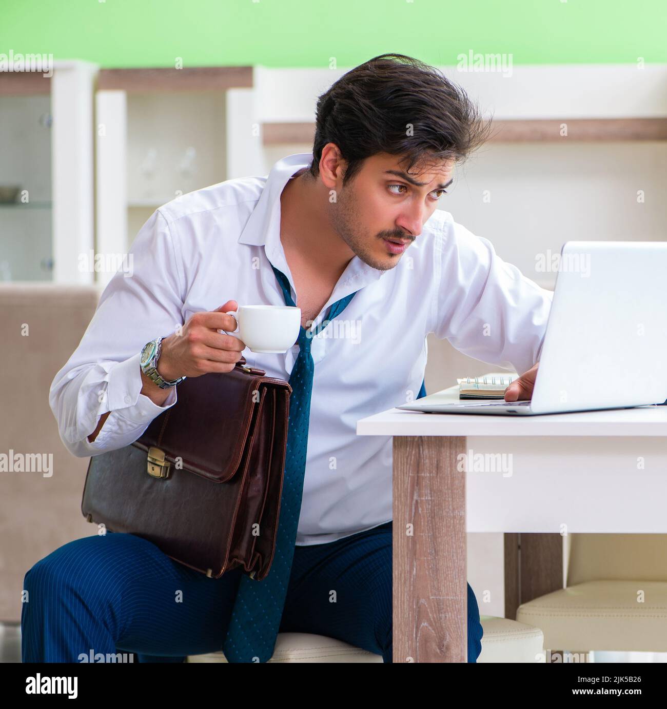 The man dressing up and late for work Stock Photo - Alamy