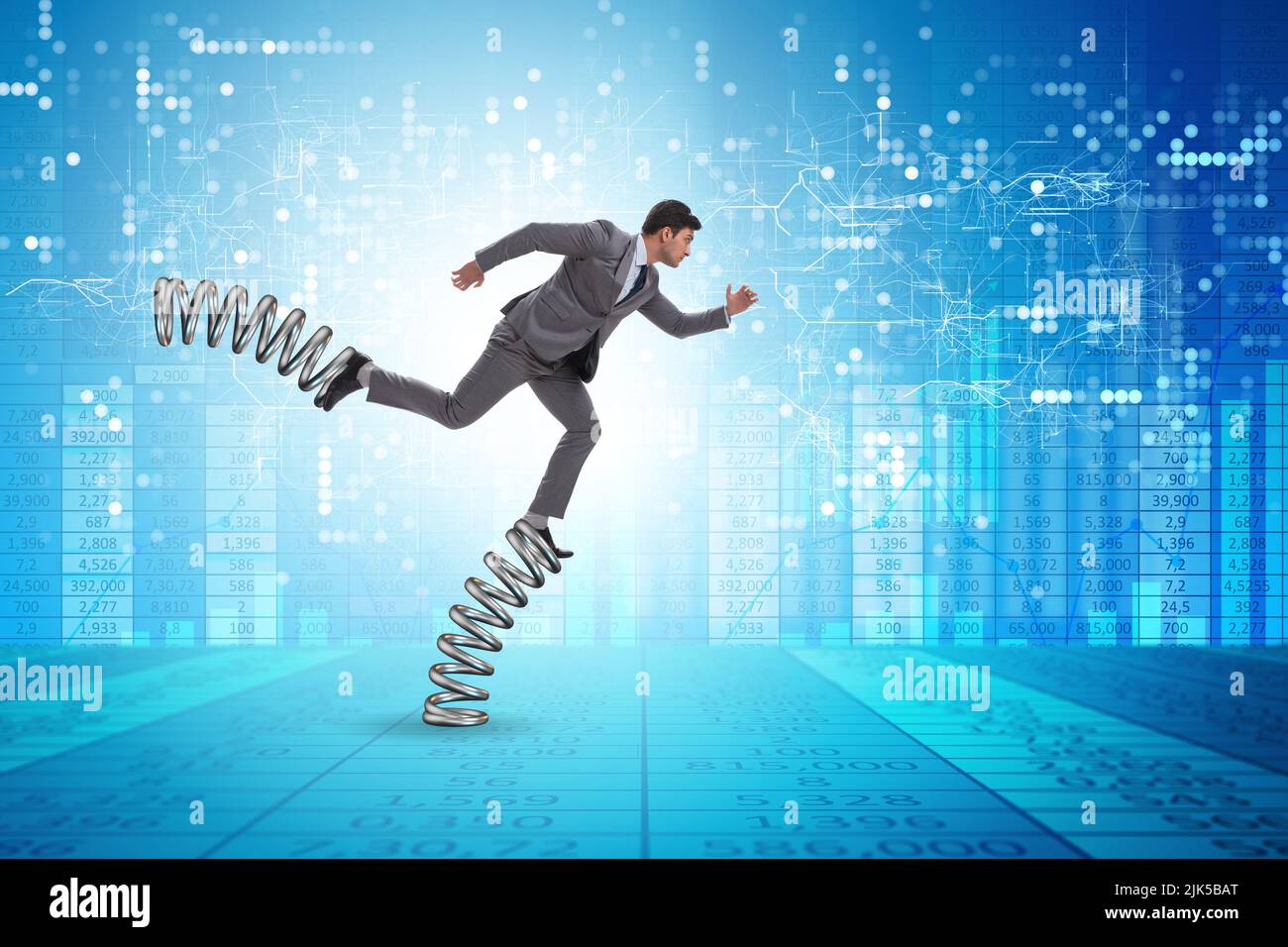 Businessman jumping high on the springs Stock Photo - Alamy