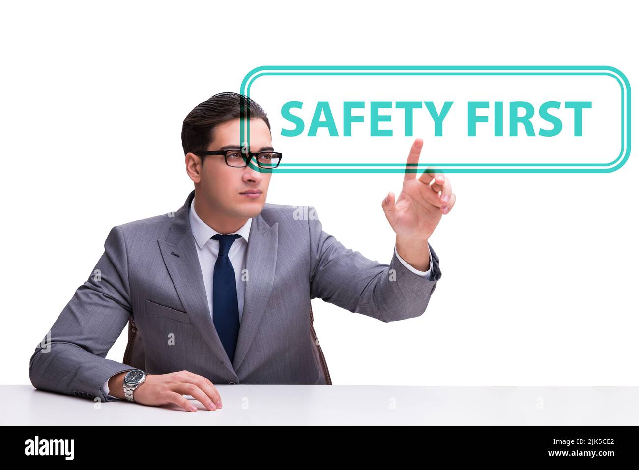 Safety first concept with the businessman Stock Photo - Alamy