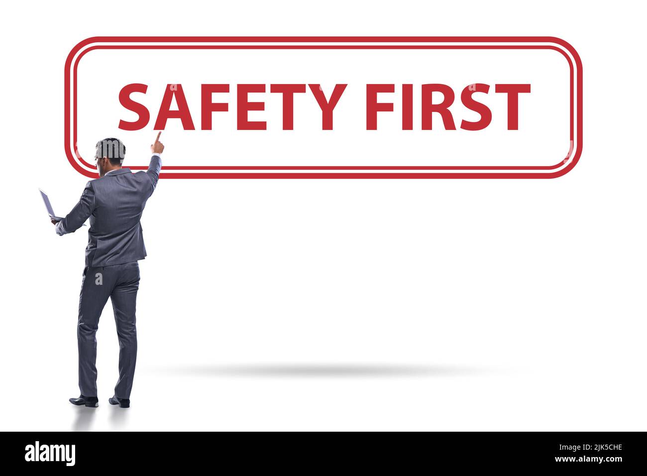Safety first concept with the businessman Stock Photo - Alamy