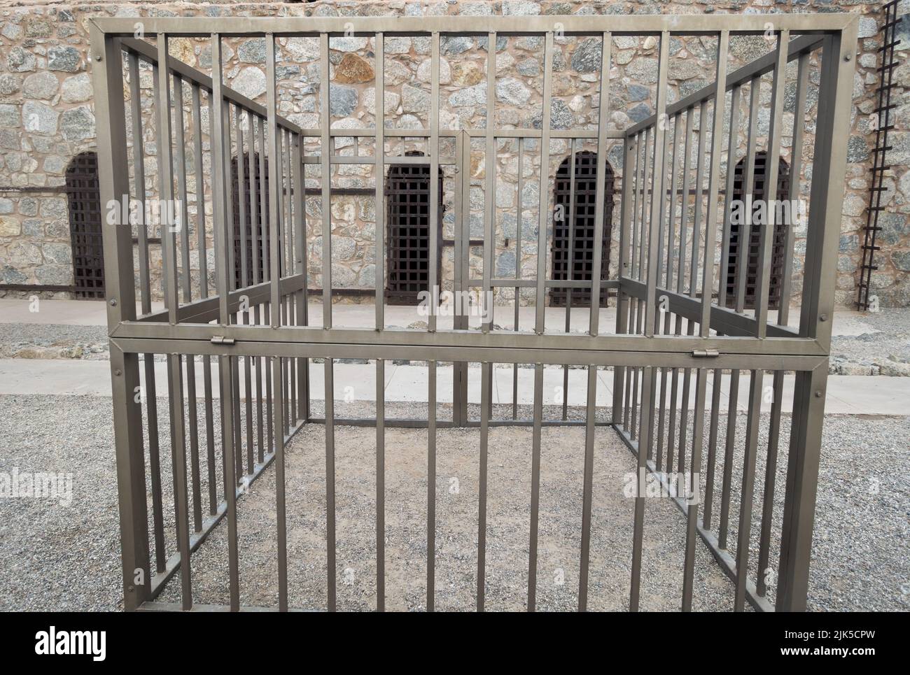 Old Iron Prison Cell Bars and Stone Wall in Courtyard of Famous Yuma ...