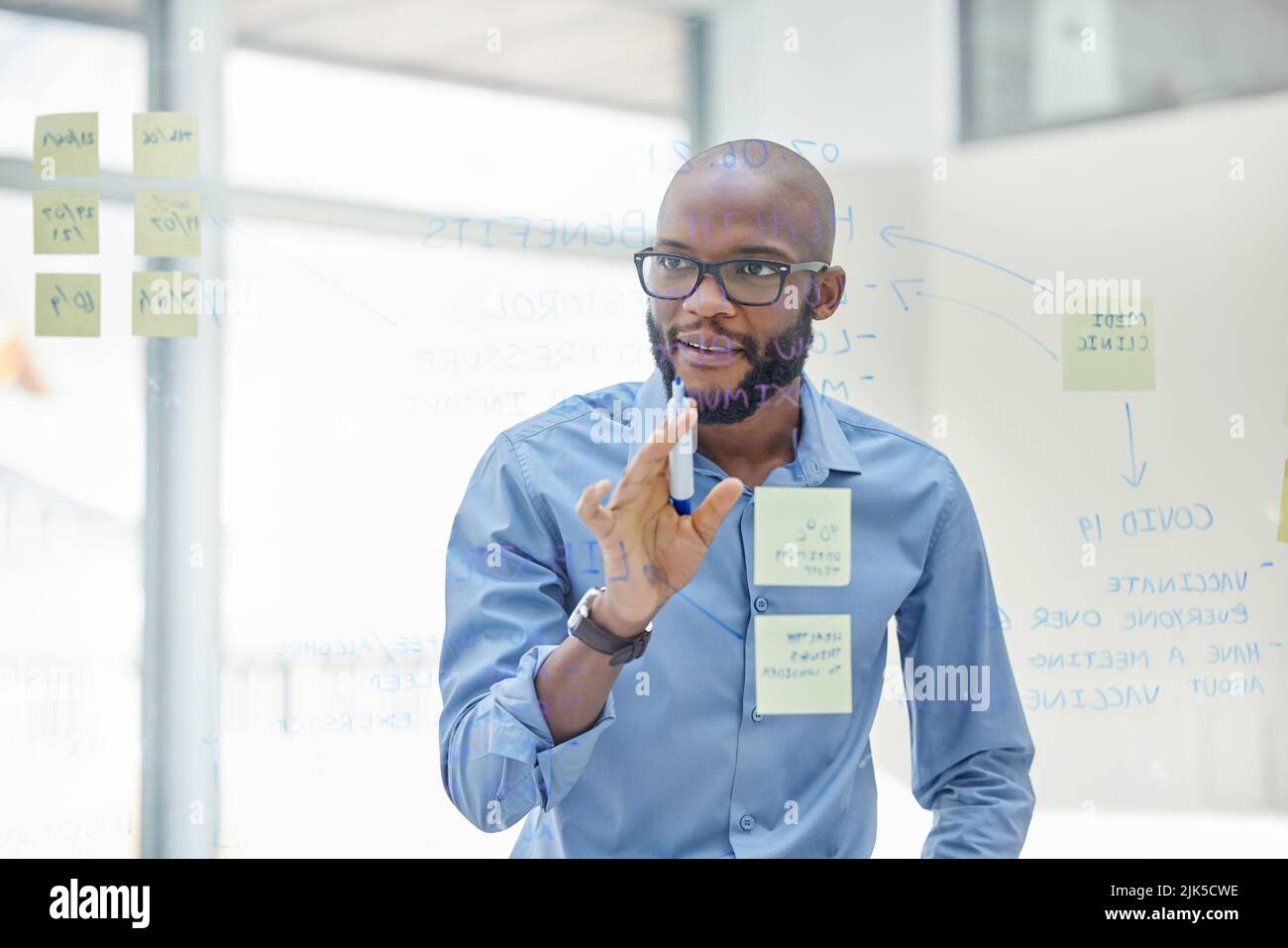 I have a plan and its a good one. a businessman brainstorming with ...