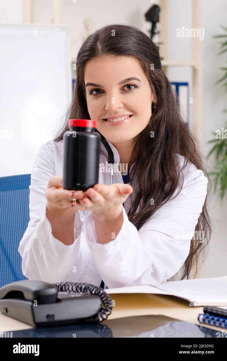 Female doctor working in the clinic Stock Photo - Alamy