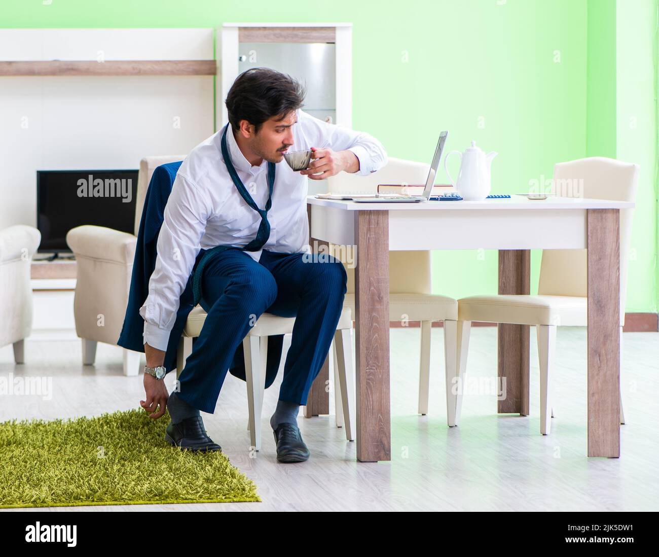 The man dressing up and late for work Stock Photo - Alamy