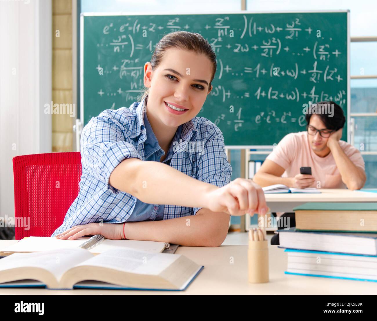 Young students taking the math exam in classroom Stock Photo - Alamy