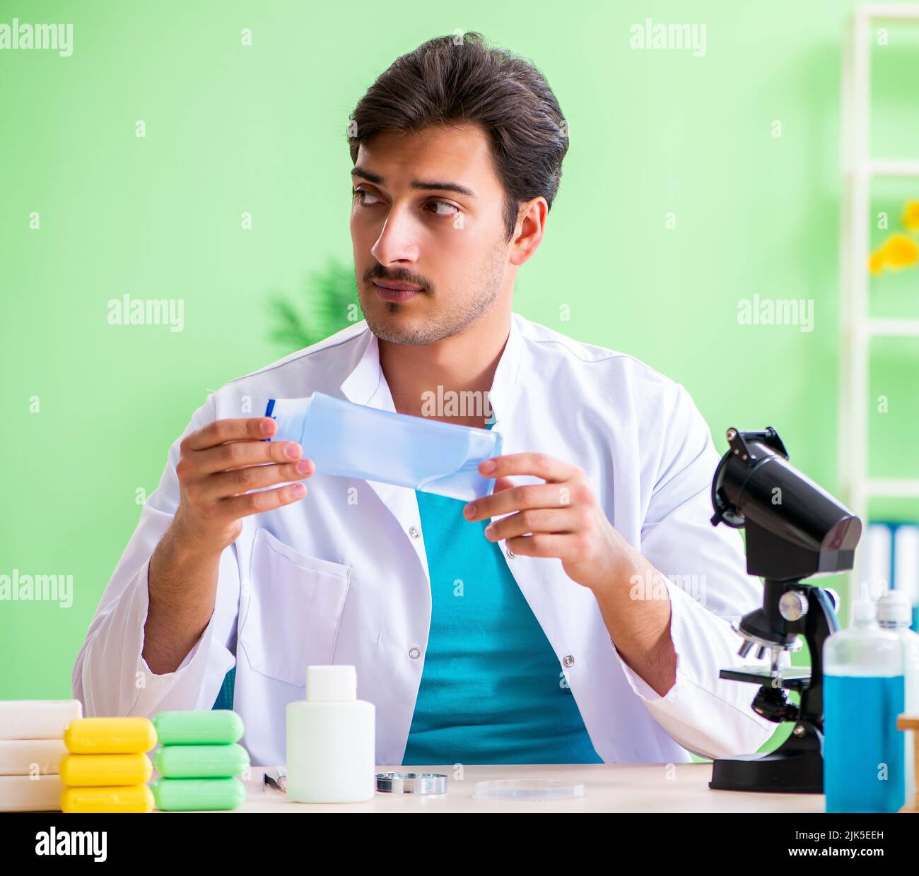 The chemist testing soap in the lab Stock Photo - Alamy